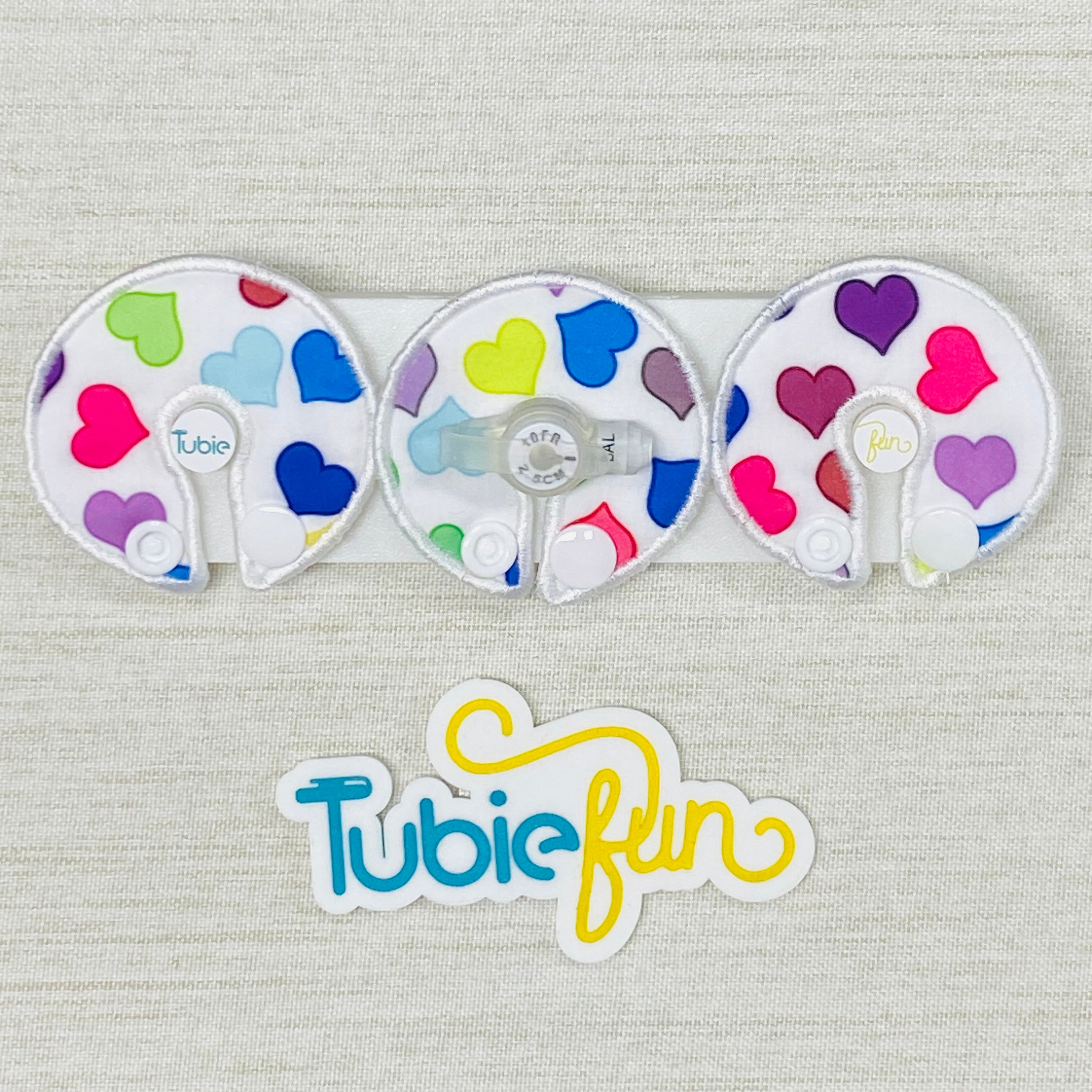 G-Tube Button Pad Cover - Coloured Hearts on White – Tubie Fun